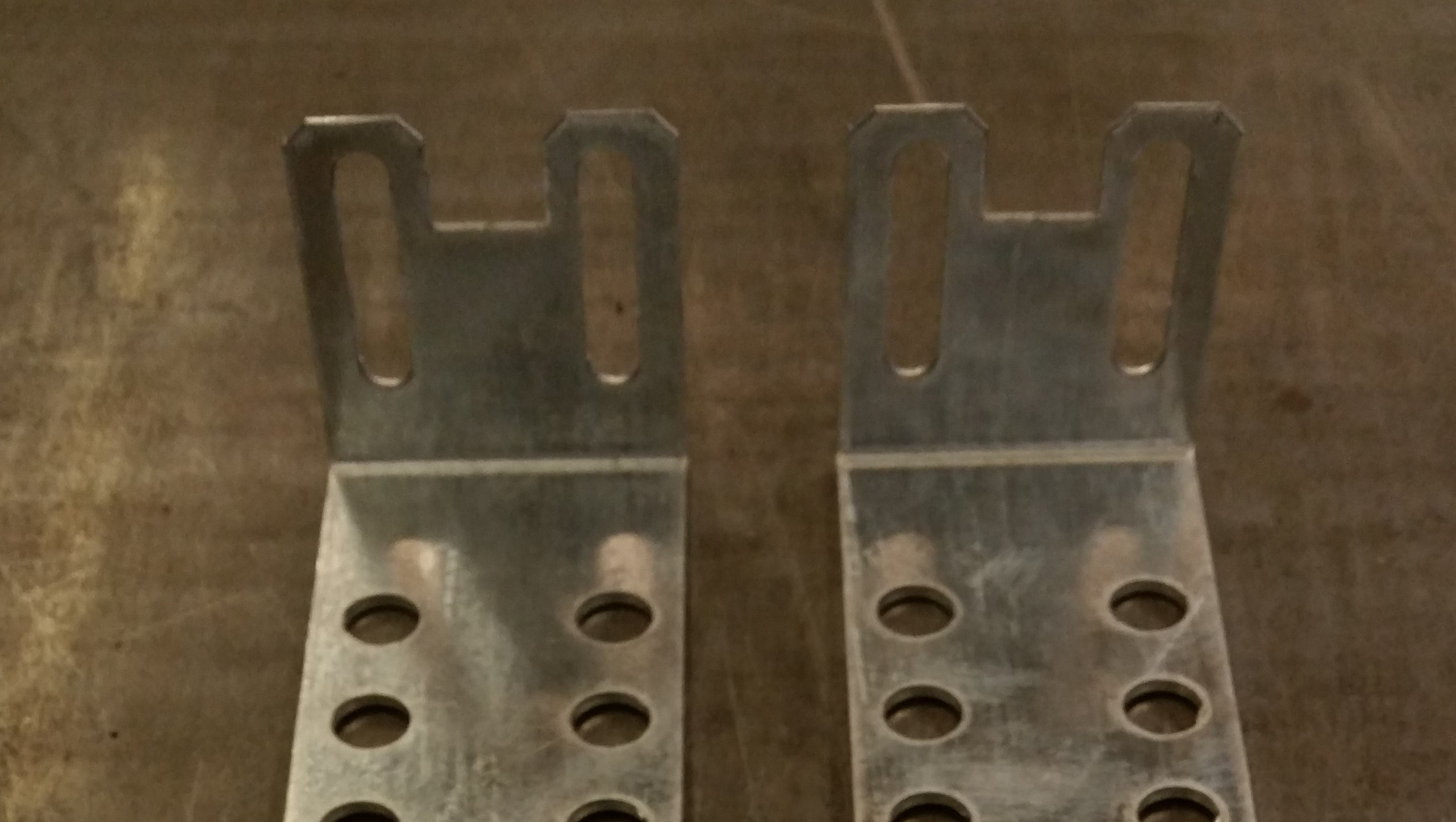Punched Angle Brackets - McKenzie Martin
